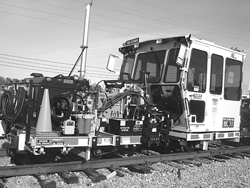 Rail Industry Component: Nordco Inc.: AA2R Anchor Adjuster Two-Rail ...